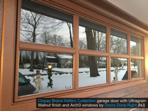 Clopay Gallery Collection Garage Door with Ultragrain Walnut Finish ...